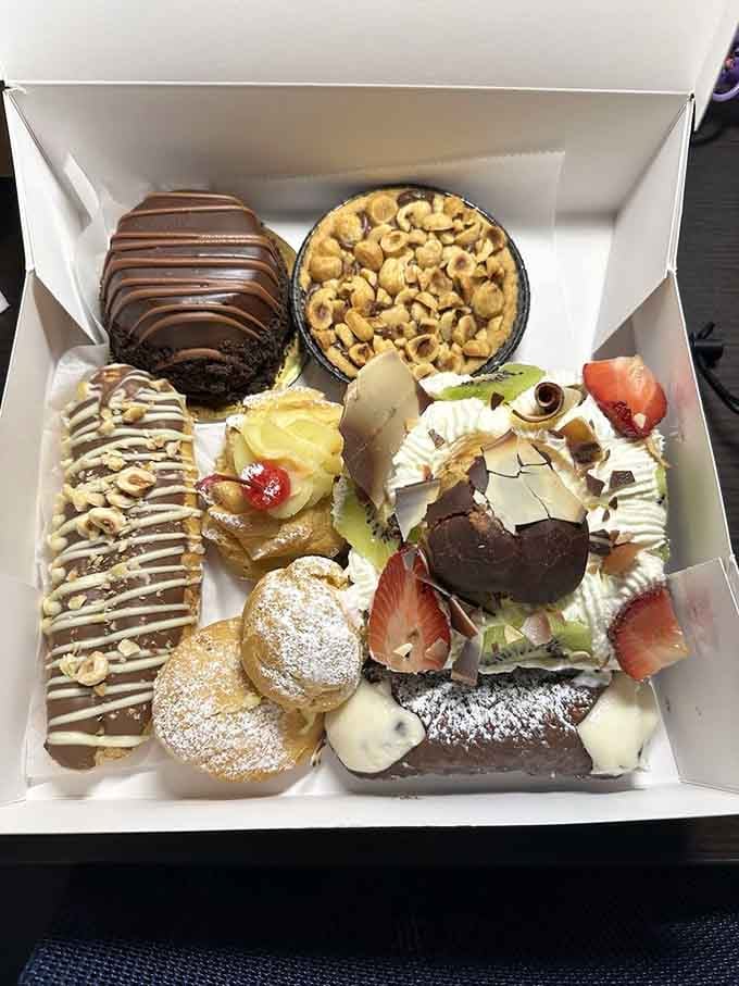 An assortment box that looks like someone raided the dessert hall of fame and crammed every trophy into one glorious container.