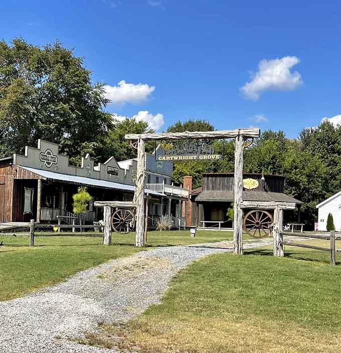 The rustic entrance arch welcomes visitors to Cartwright Grove, where Kentucky meets the Wild West without requiring a cross-country journey.