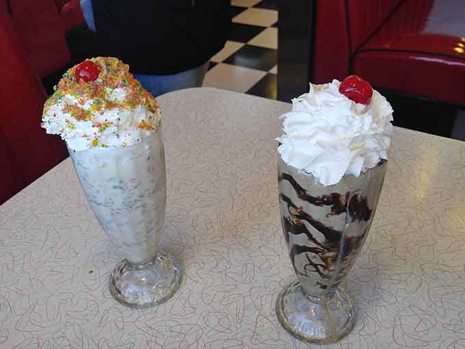 Classic milkshakes topped with whipped cream and cherries, because dessert for breakfast is totally acceptable here.