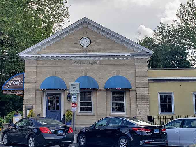 Three arches of pure architectural confidence, housing the kind of place that makes you glad you got hungry today.