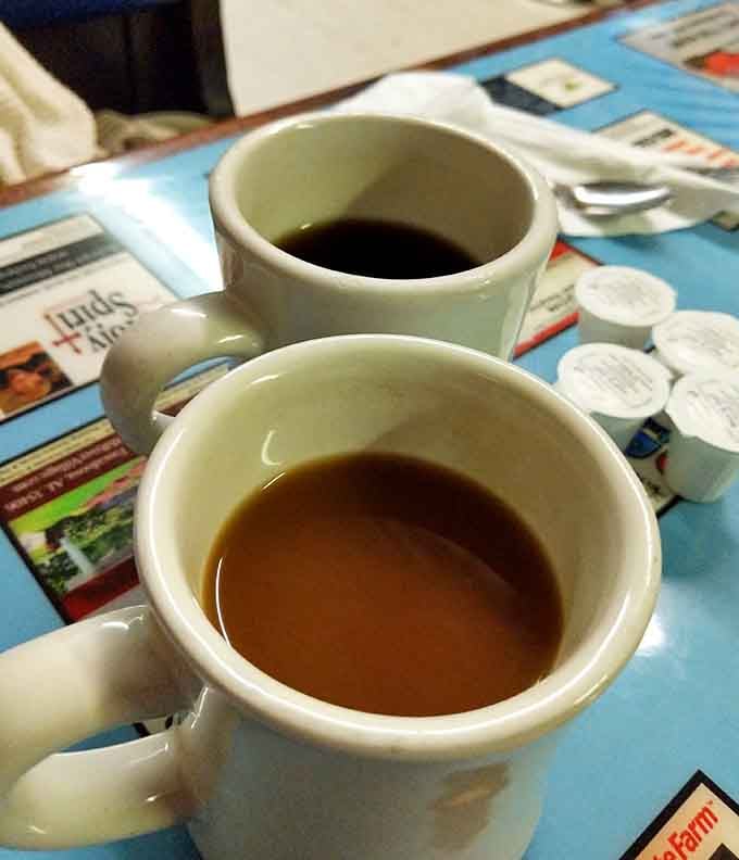Two steaming cups of coffee that actually taste like coffee, not like someone waved a bean over hot water.