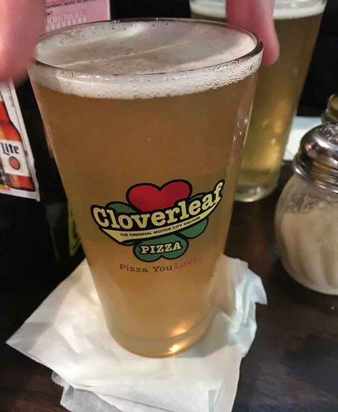 Cold beer in a Cloverleaf glass pairs perfectly with hot pizza &ndash; some combinations are simply meant to be together.