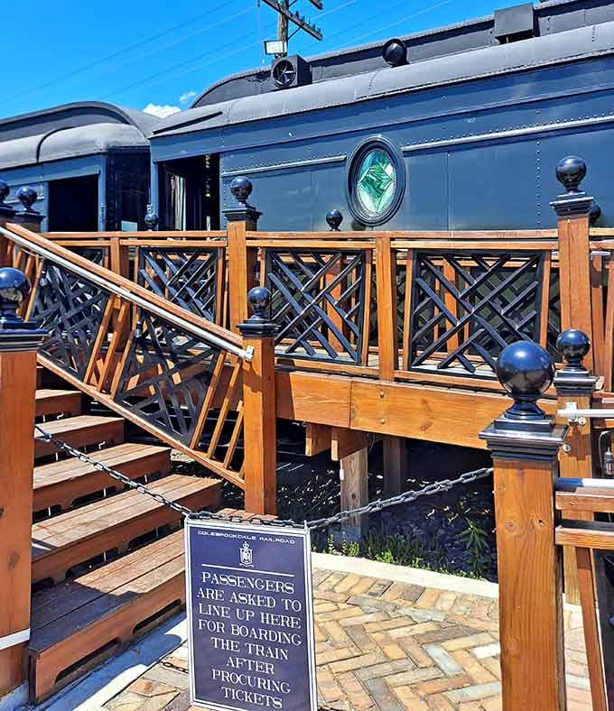 The boarding platform beckons with wooden stairs and vintage charm, promising adventure just a few steps away from ordinary life.