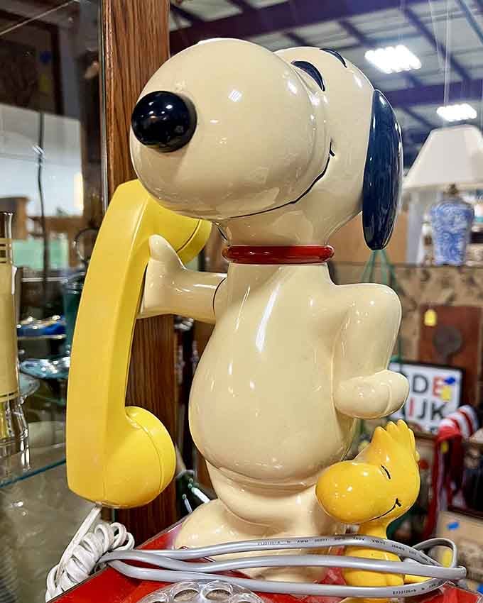Even Snoopy knows the best conversations happen on vintage phones, preferably in cheerful yellow and red.