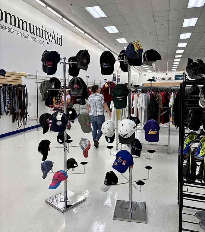 Baseball caps displayed like a museum exhibit of every team, event, and random logo you could possibly imagine.