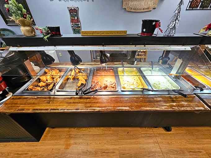 The hot buffet line where every steam tray holds another reason to loosen your belt another notch.