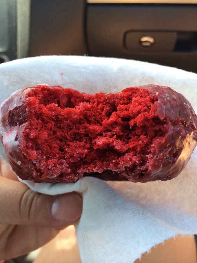 Red velvet cake donuts bring the drama with their deep crimson interior that's almost too pretty to eat.