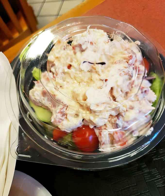 Lobster salad so loaded it looks like the crustacean exploded in the best possible way.