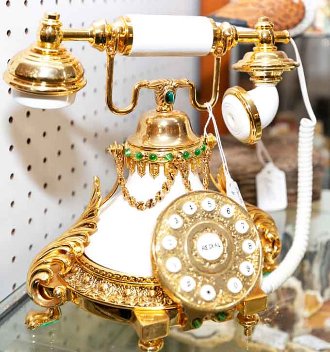 This ornate rotary phone gleams like it's expecting a very important call from 1975, jewels and all included.