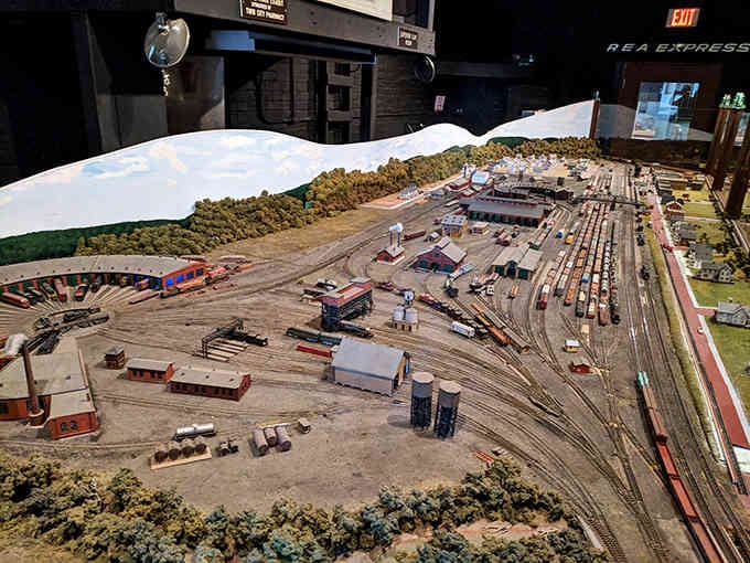 This intricate model railroad brings the bustling depot operations to life in miniature, showing the complexity of wartime logistics.