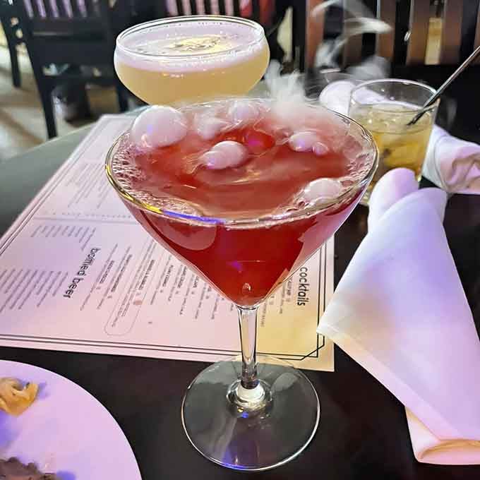 A cocktail so dramatic it practically demands its own spotlight and a round of applause from nearby tables.