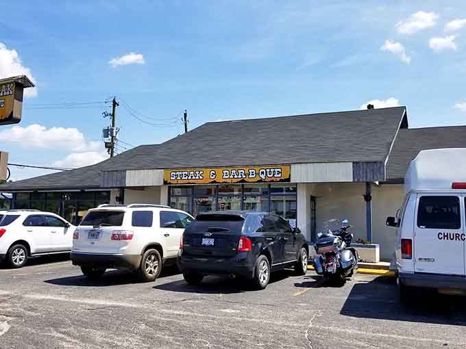 B C Steak & BBQ where the parking lot tells you everything you need to know about the food inside.