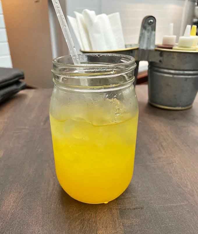 Fresh passion fruit agua fresca in a mason jar tastes like sunshine, vacation, and everything good about authentic Mexican beverages.