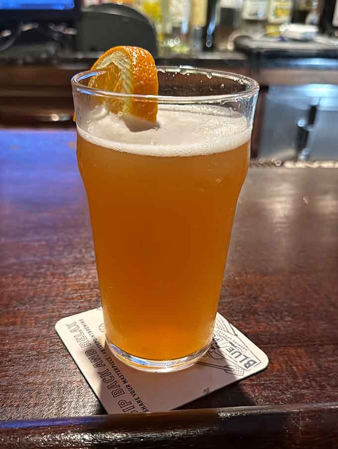 Cold beer with a citrus twist, because even legendary burger joints know how to pour a proper pint.