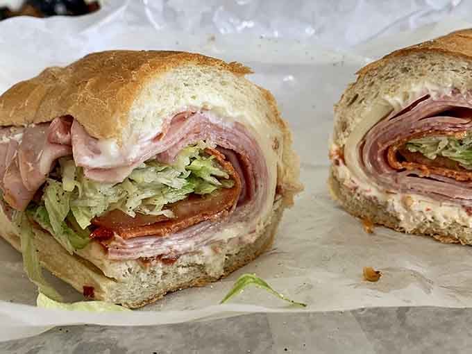 That Italian sub is stacked so high it requires an engineering degree to eat it properly.