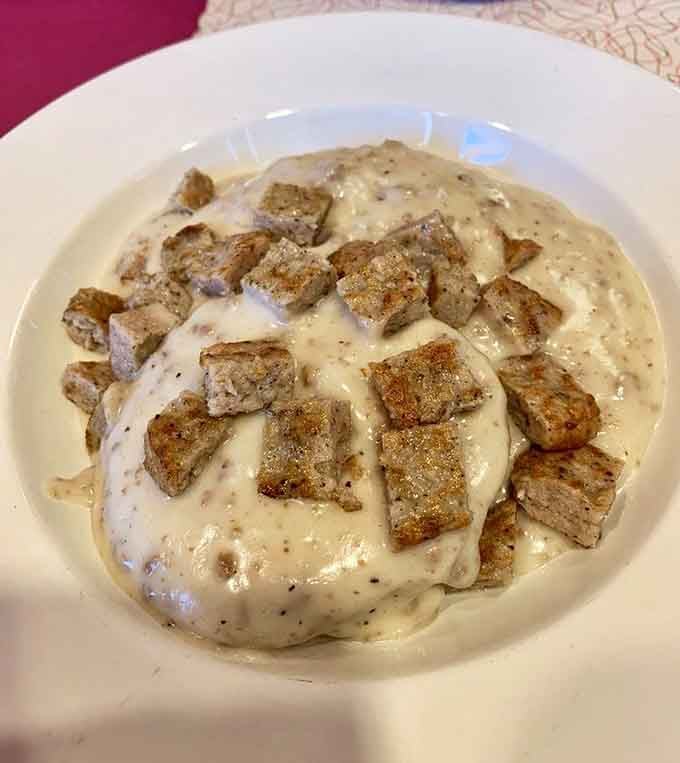 Biscuits and gravy so hearty they could fuel a full day of avoiding actual responsibilities with zero regrets.