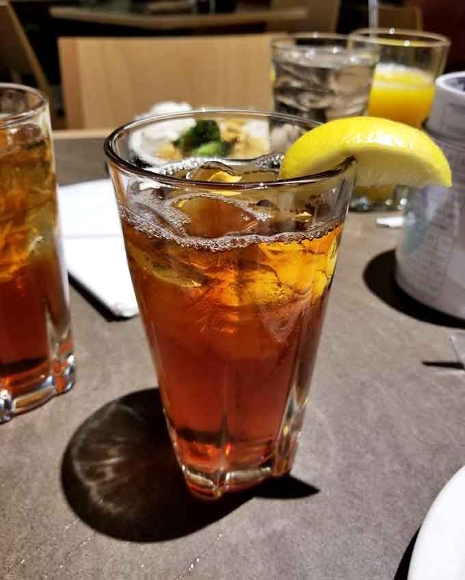 Iced tea with lemon sits ready to wash down whatever culinary decisions you're about to make today.