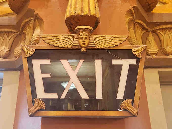 Even the exit signs get the pharaoh treatment, because why leave ancient Egypt at the door?