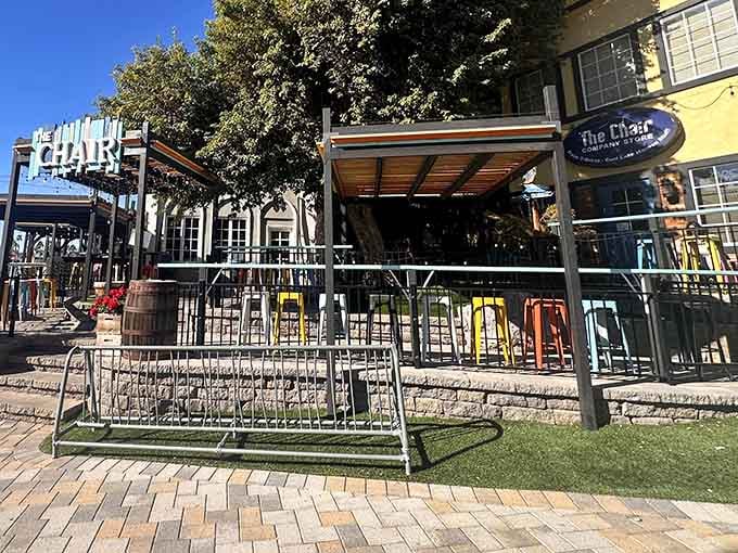 Colorful outdoor seating areas invite lingering, because rushing through fake England defeats the entire delightful purpose.