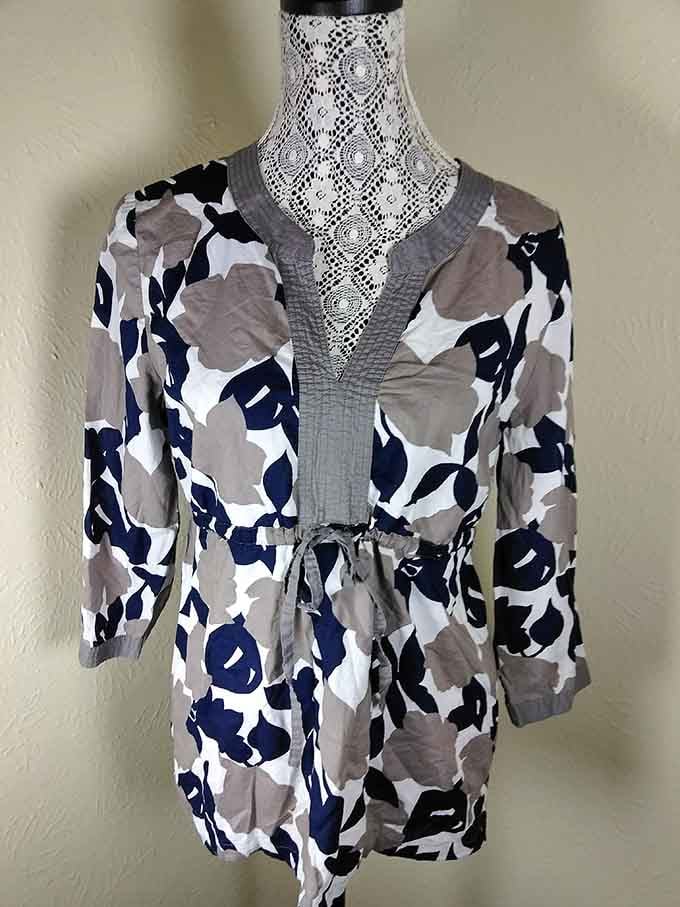 Bold geometric patterns on this flowing tunic prove the seventies had some genuinely groovy fashion moments worth revisiting.