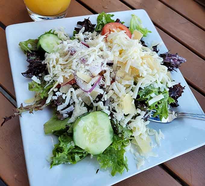 Fresh salad topped with enough cheese to make any cardiologist nervous but any diner absolutely delighted.