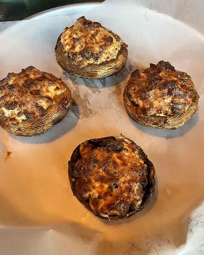 These cream cheese-stuffed mushrooms offer a surprisingly elegant start before the barbecue main event begins in earnest.