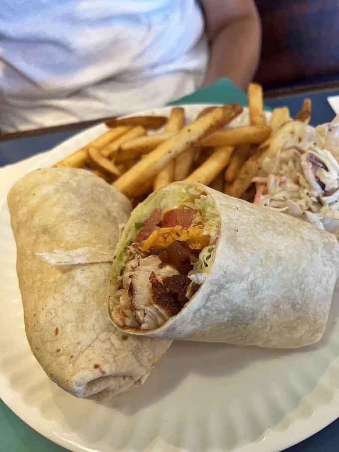 This wrap proves that blackened mahi and bacon together create magic that defies all culinary logic beautifully.