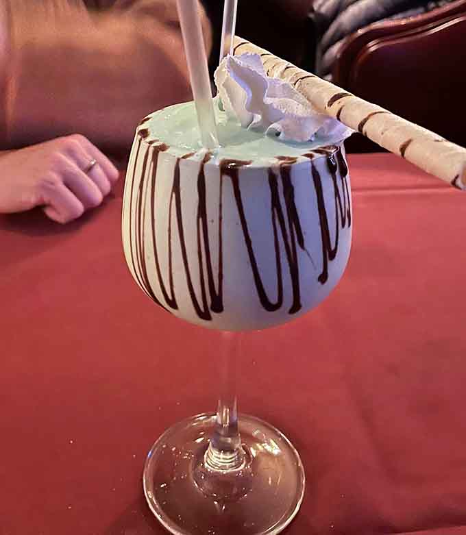 This whimsical cocktail with chocolate drizzle and whipped cream is dessert and drink rolled into one glorious indulgence.