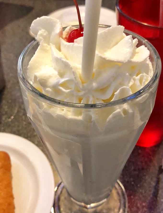 Topped with whipped cream and a cherry, this classic milkshake proves some traditions never go out of style.