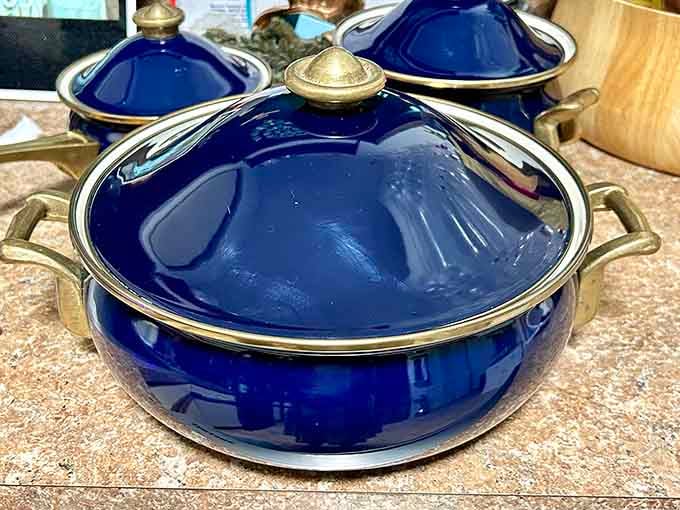 Cobalt blue cookware that's survived longer than most marriages and still looks absolutely stunning on display.