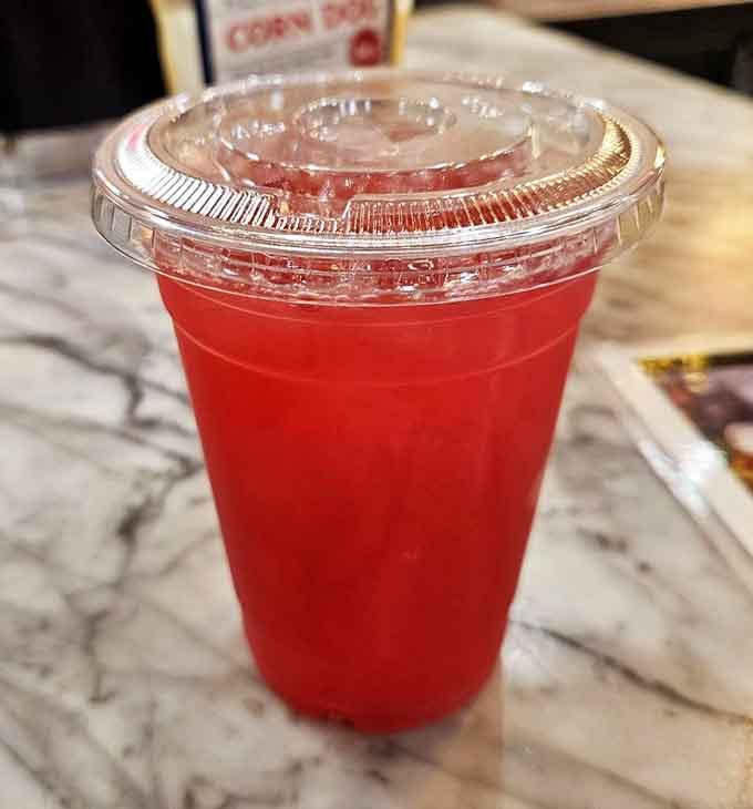 Bright pomegranate lemonade refreshes like summer in a cup, the perfect counterpoint to all that glorious fried goodness.