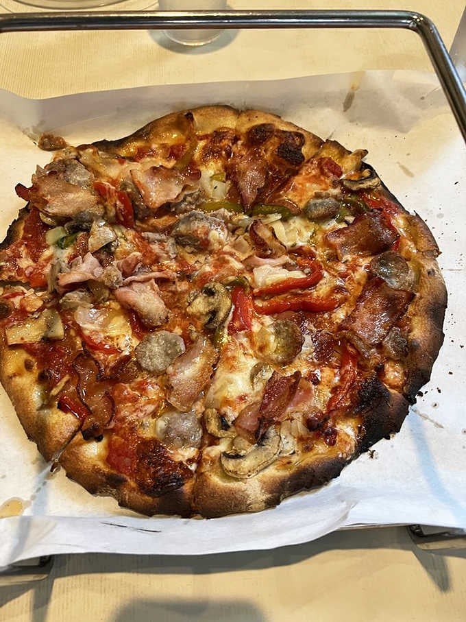 The Special pizza loaded with toppings demonstrates that restraint isn't always necessary when quality ingredients are involved throughout.