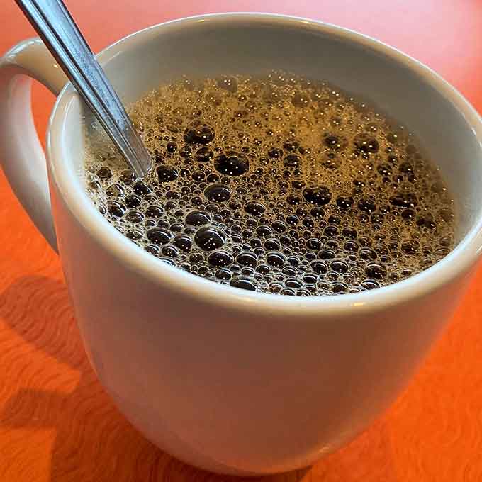 That perfect cup of diner coffee, steaming hot and ready to jumpstart your day the old-fashioned way.