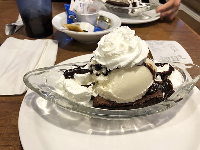 This brownie sundae with whipped cream is basically happiness served in a glass dish with a spoon.