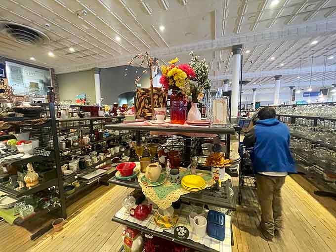 Housewares galore stretching into the distance, where decorative vases and kitchen gadgets live their best secondhand lives together.