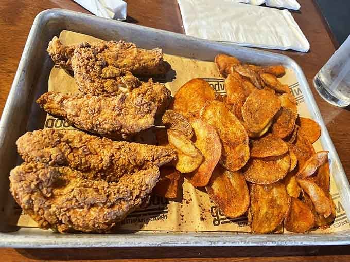 Golden fried chicken tenders with those crispy potato chips prove that simple done right beats fancy every time.
