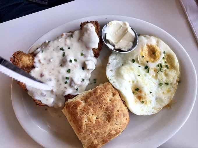 Country fried steak blanketed in creamy gravy with eggs cooked just right makes mornings worth waking up for.