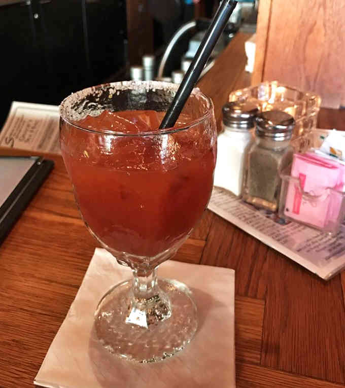 A Bloody Mary with a salted rim means someone here understands the assignment and executed it perfectly.