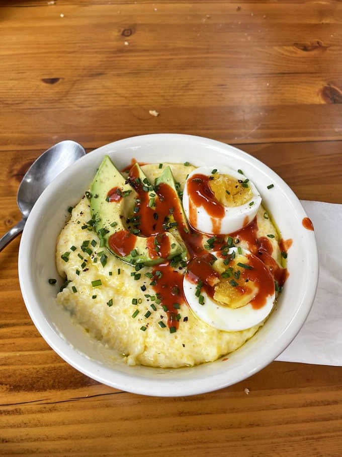 Creamy grits topped with a perfectly poached egg&mdash;Southern comfort food that hugs you from the inside out.