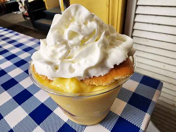 Banana pudding topped with whipped cream, the Southern dessert that makes grown adults fight over the last spoonful.