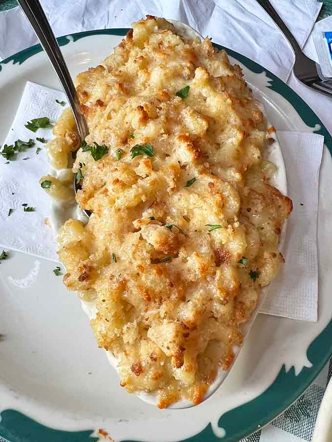 Mac and cheese this golden and bubbly should probably come with a warning label about portion control abandonment.