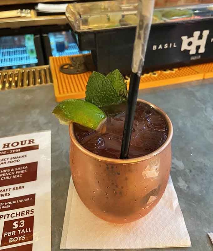 A proper mule in a copper cup, because even cowboys need something cold to wash down all that smoke.