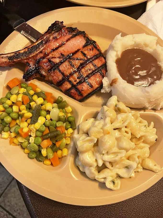 That char-grilled pork chop with all the fixings shows Hodak's doesn't play favorites with their proteins.