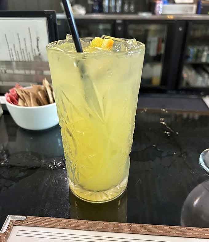 That citrus-bright mimosa catches the light like liquid sunshine, making brunch feel like a proper celebration.