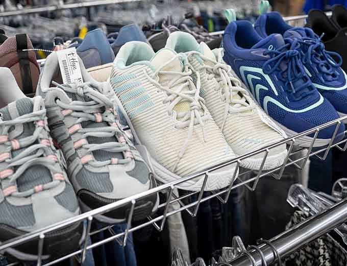 Perfectly good shoes lined up like they're auditioning for a second chance at life on your feet.