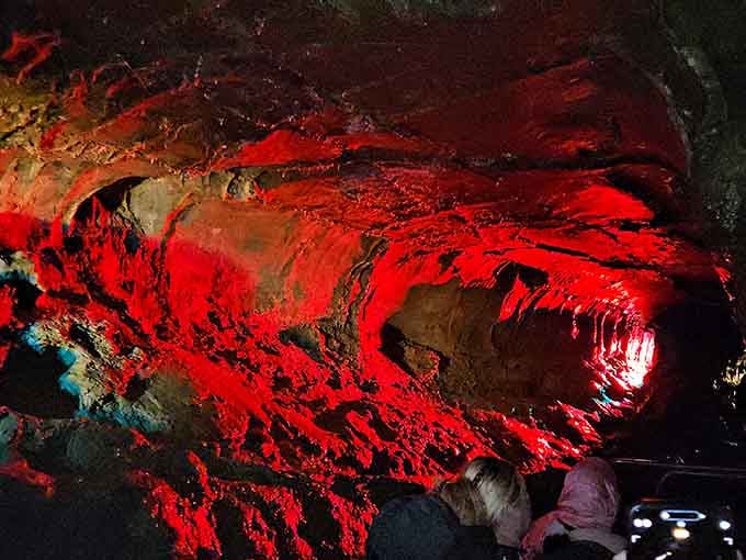The red lighting transforms the cave into something that looks like it belongs in a sci-fi epic.