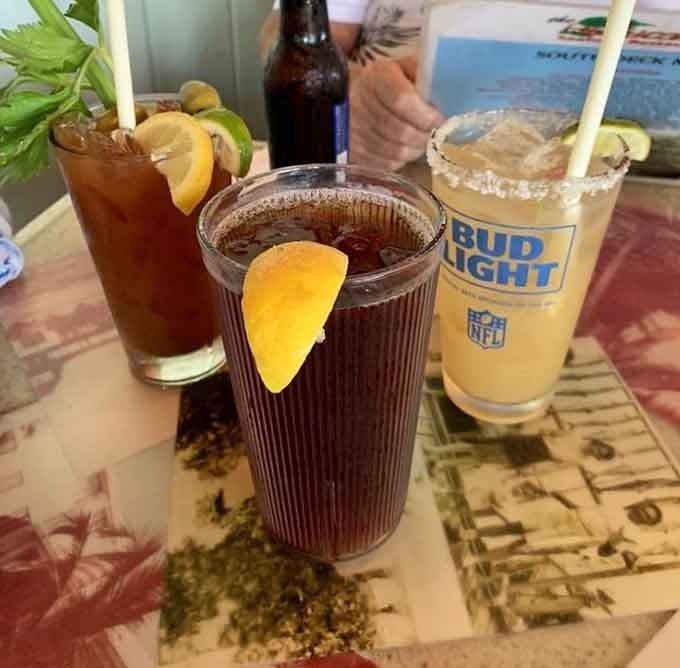 Cold drinks with citrus garnishes taste better when you're this close to the water that inspired them in the first place.