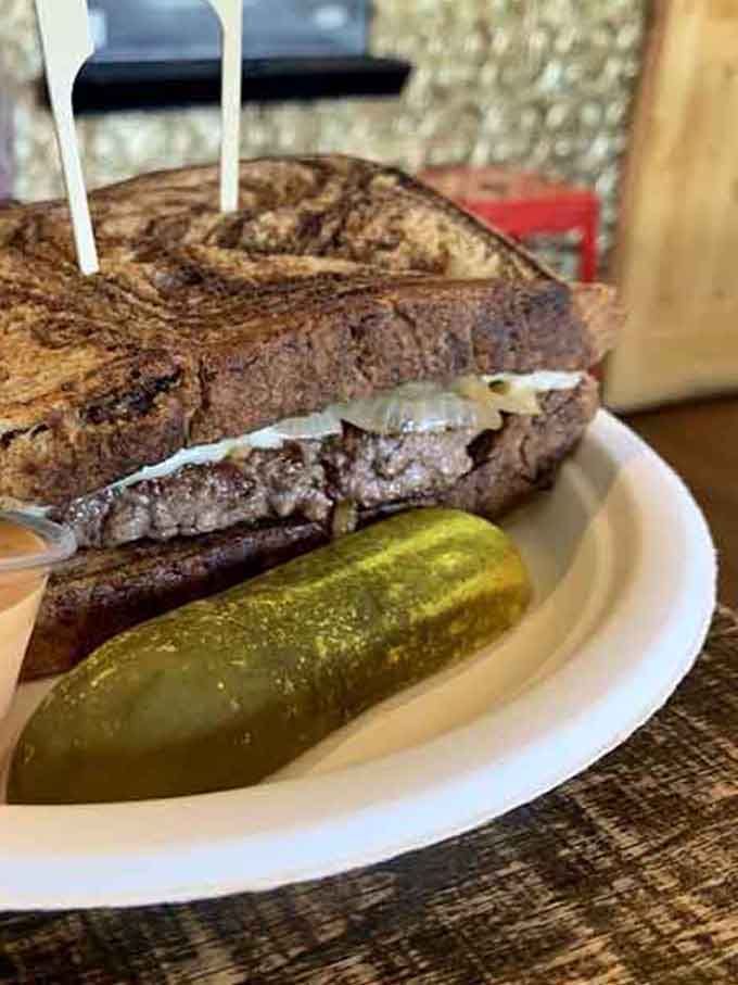 This patty melt on marbled rye is what happens when comfort food gets a standing ovation.