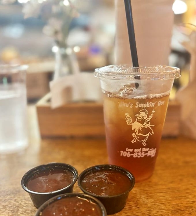 Sweet tea with three kinds of barbecue sauce waiting nearby is the Southern hospitality trifecta you didn't know existed.