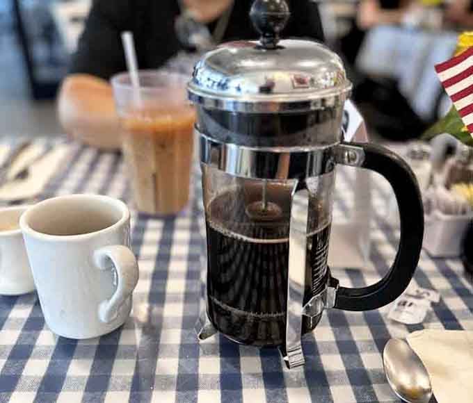 French press coffee at your table means you're in control of your caffeine destiny this morning.